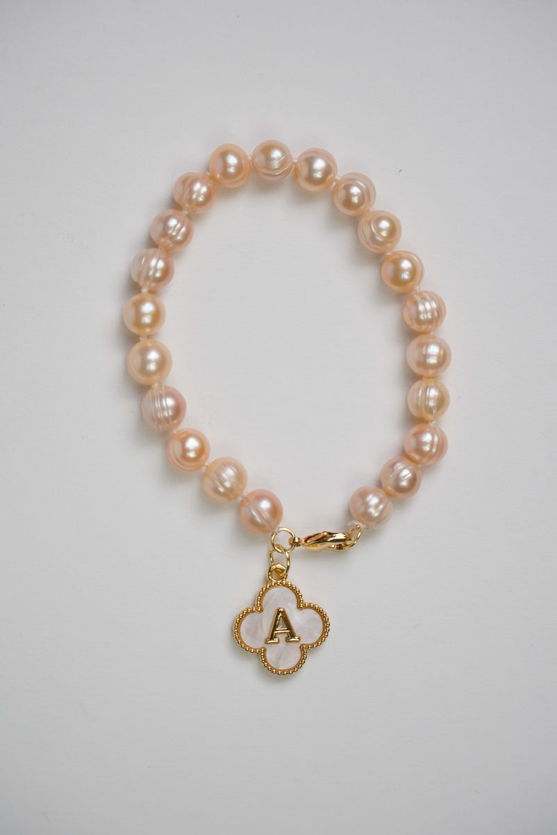 Freshwater Pearl Bracelet with Clover Letter Pendant in Peach – Kultura ...